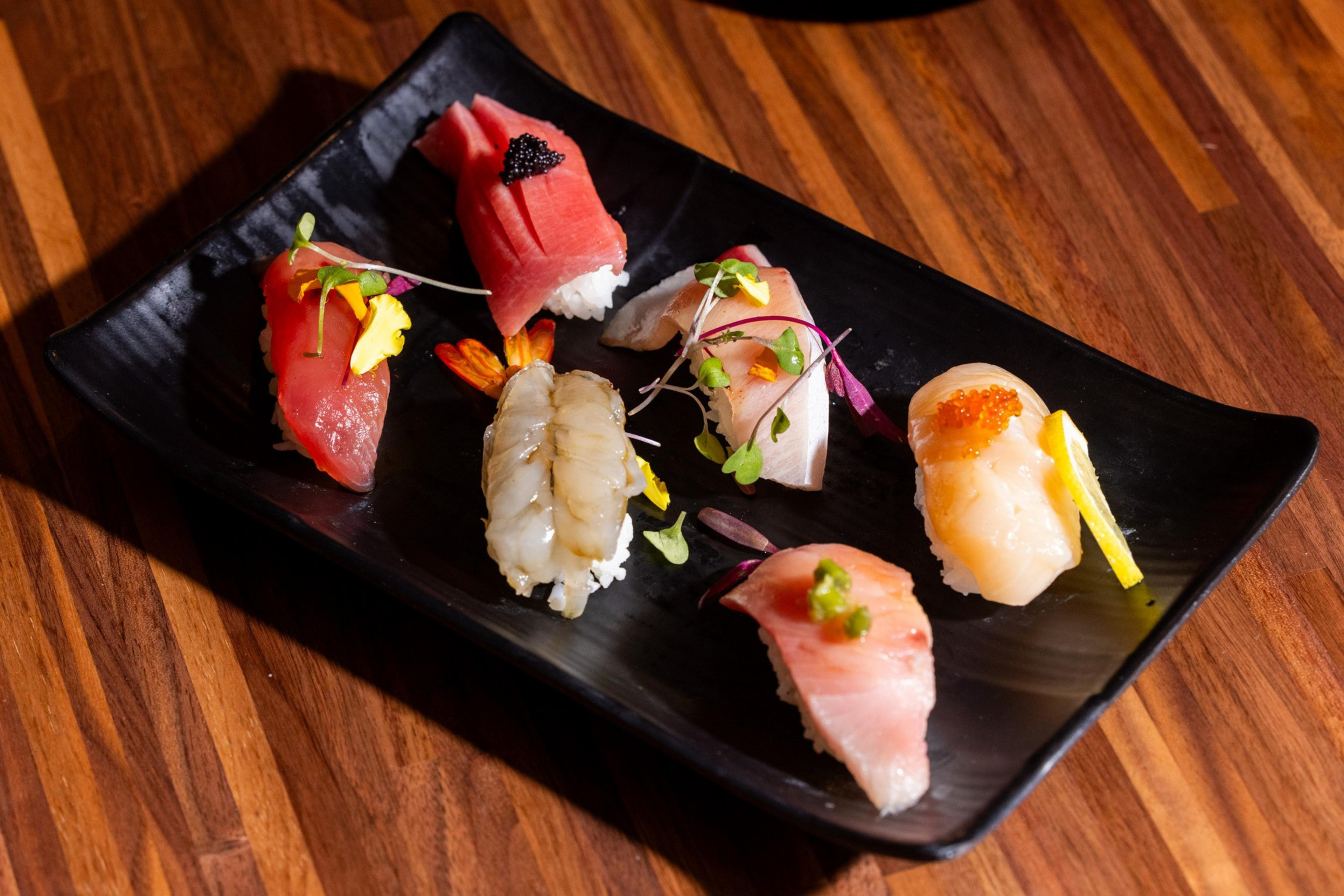 Ready to Party Pig? A new all-you-can-eat sushi and hotpot spot draws lines