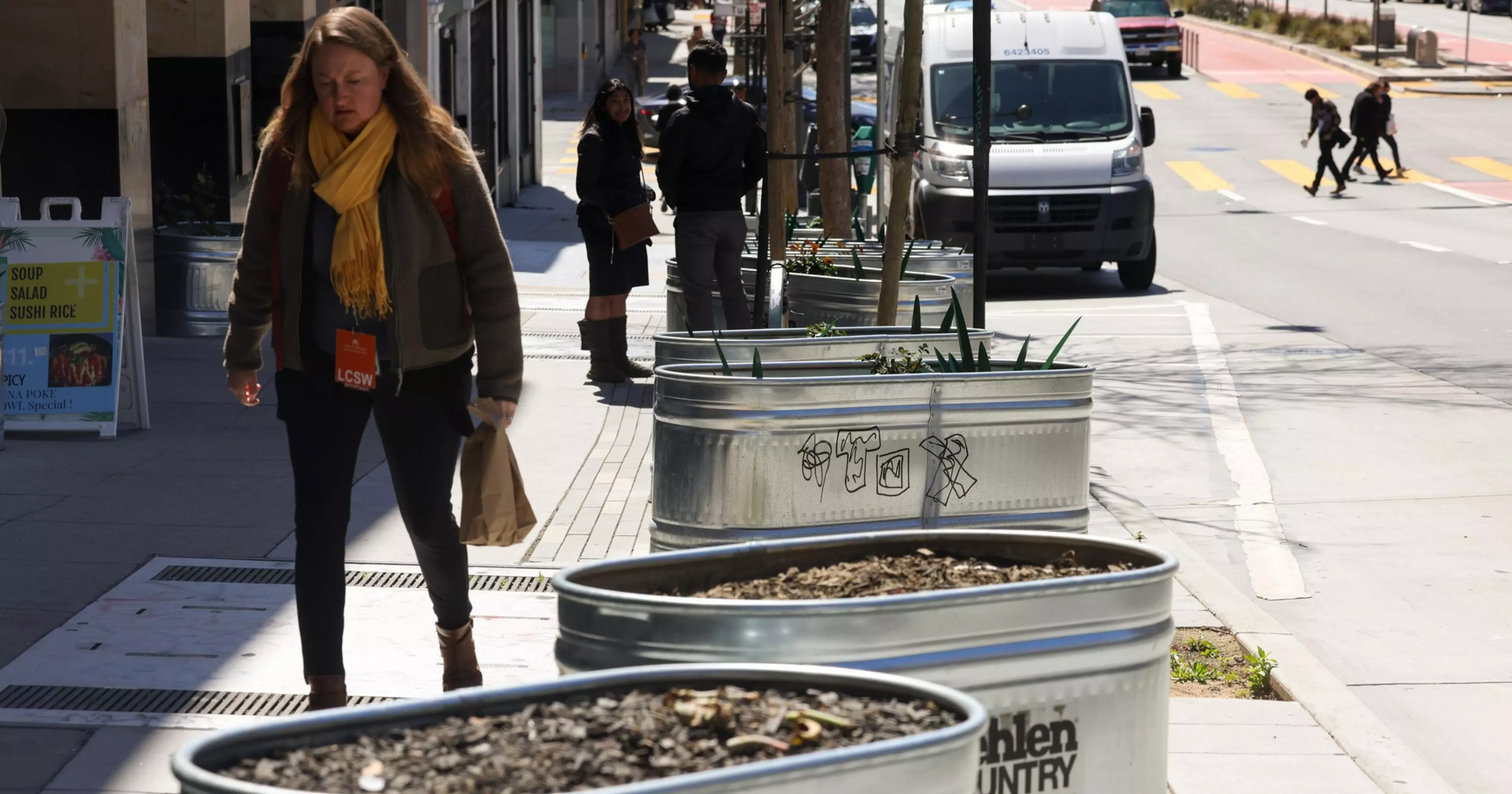 ‘Hostile architecture’ or just planters? Owners are cited by city after ...