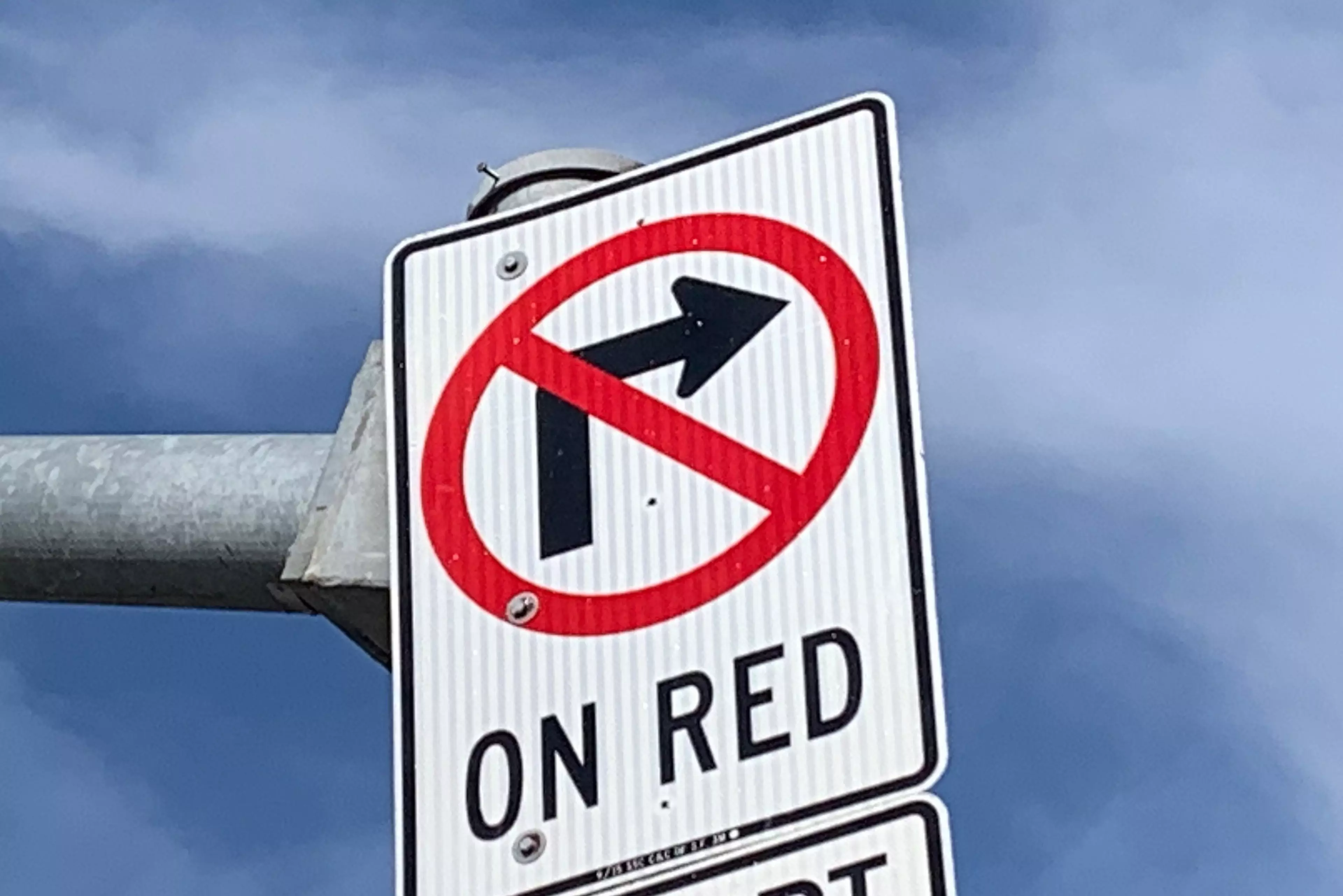 City bans right turn on red at 200 downtown intersections. Activists ...