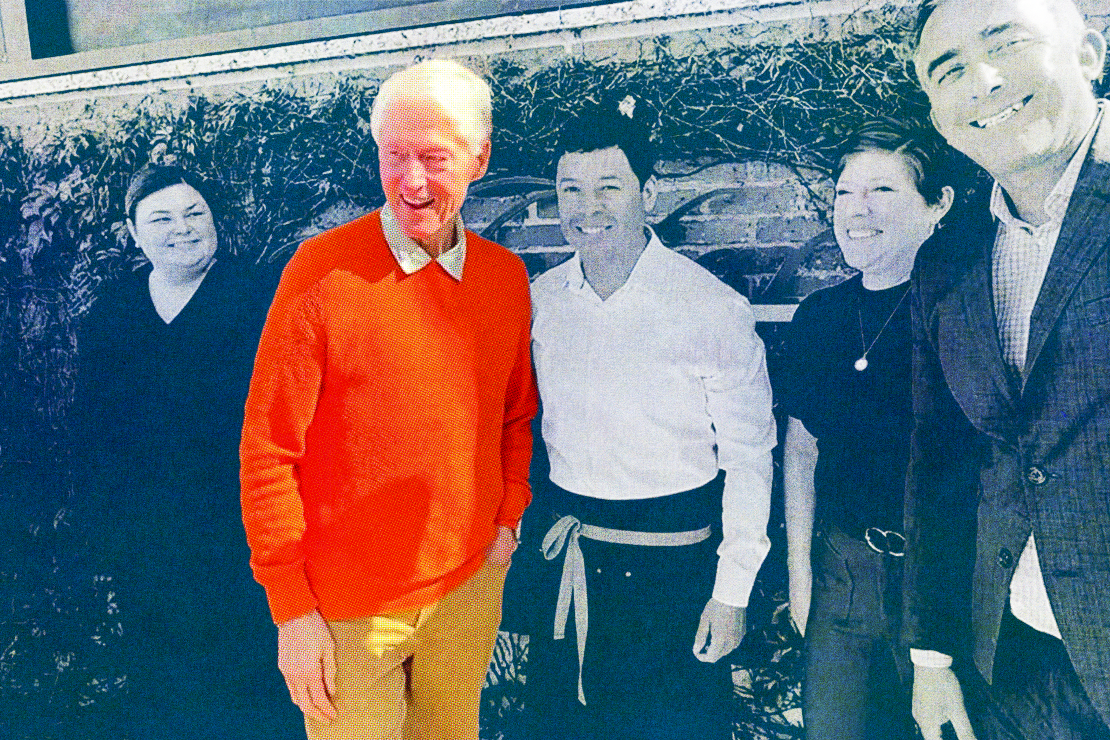Five people stand outside against a brick wall with ivy; one man wears ...