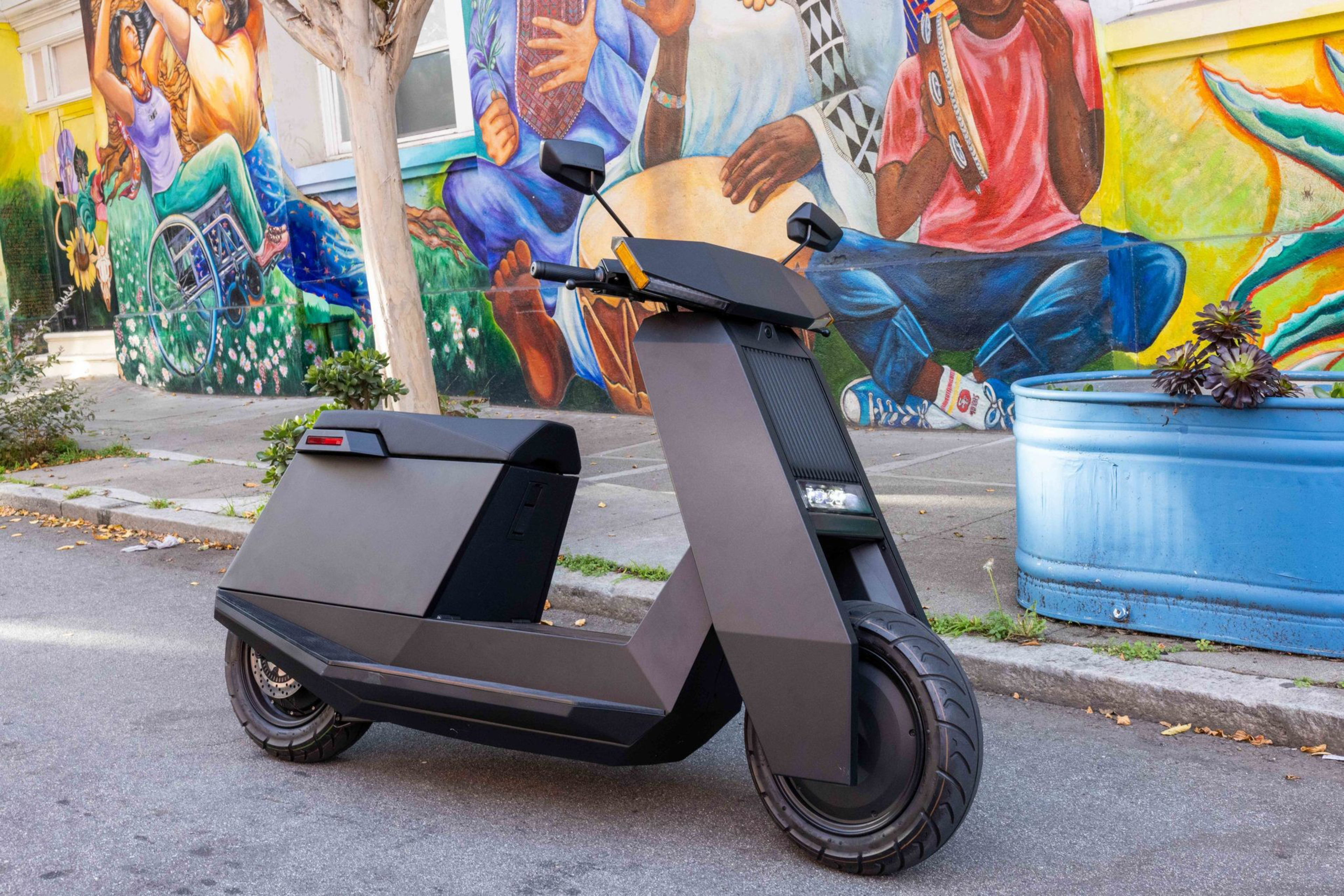 It looks like a Cybertruck mated with a Vespa. But how does this $10K ...