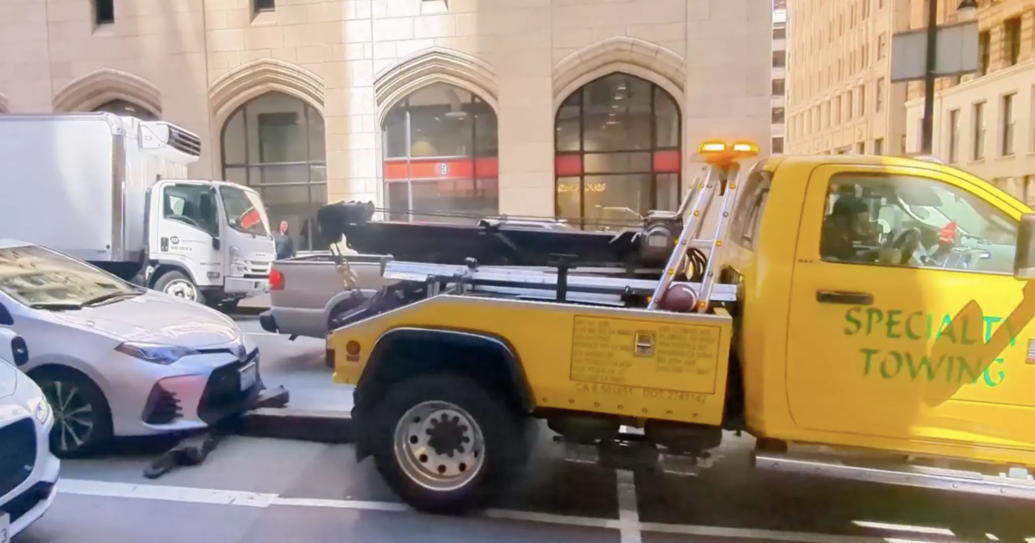 Everything we know about that viral tow truck video as police launch ...