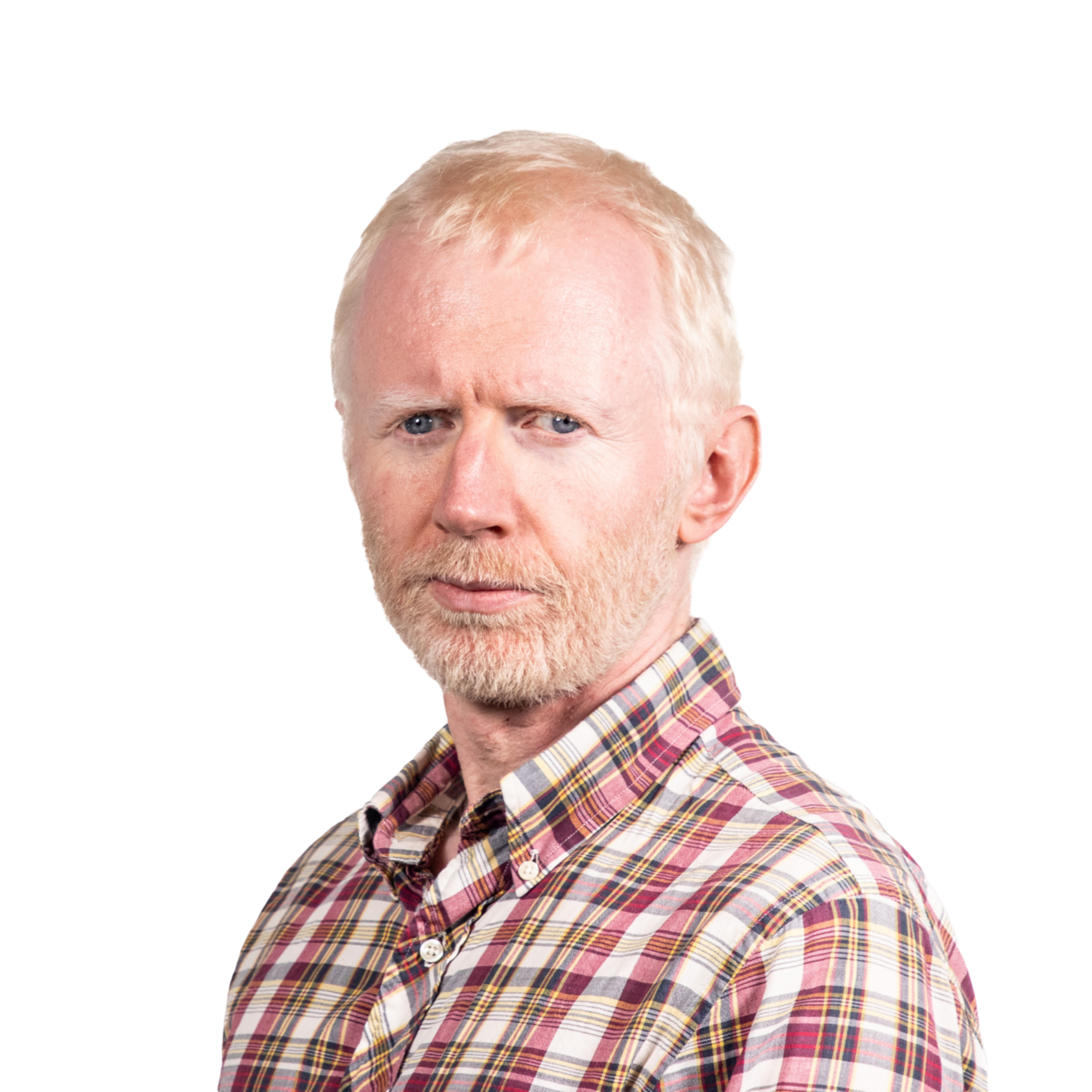A middle-aged man with short blonde hair and a beard wears a purple ...