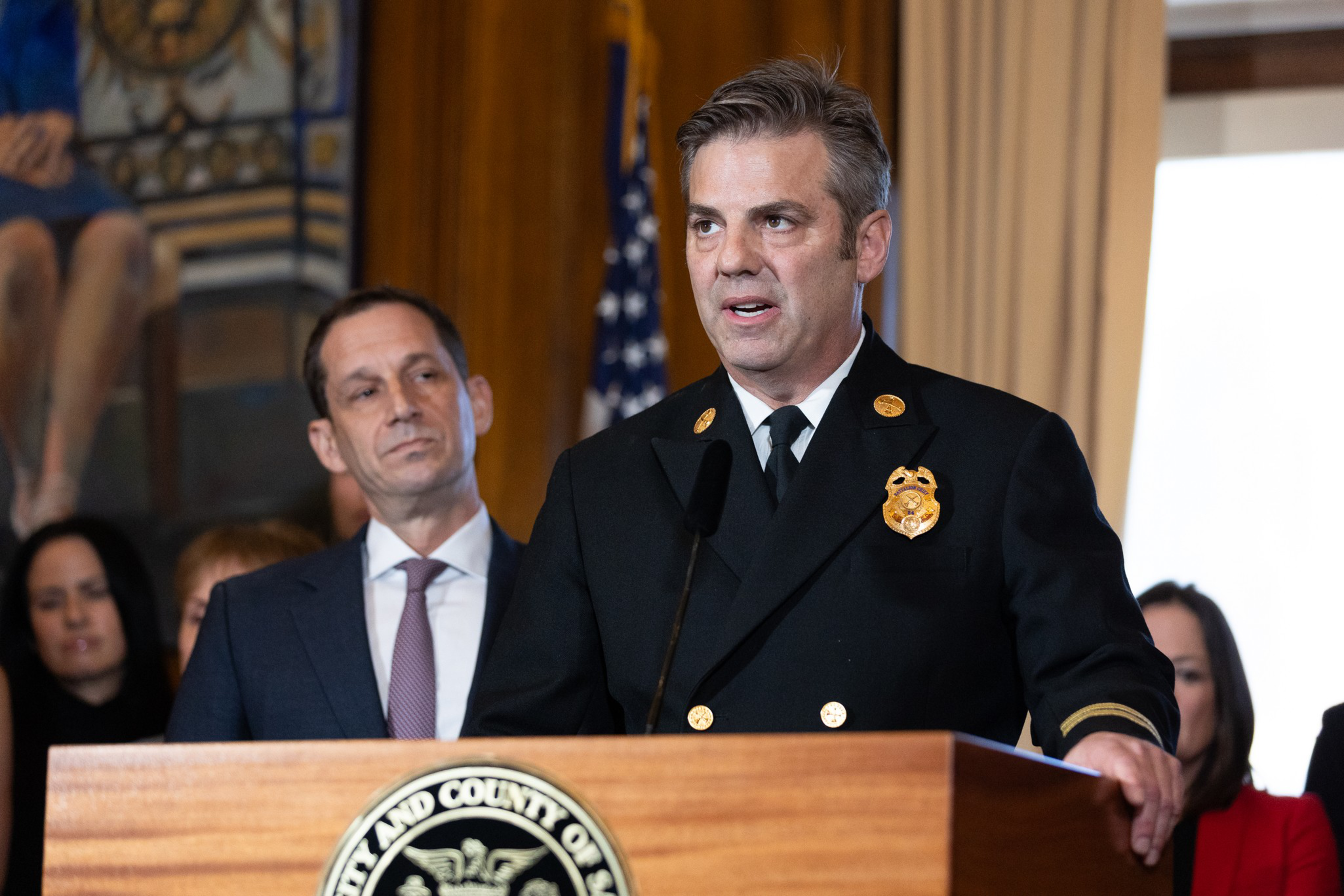 Fire Department Chief Dean Crispen, pictured at the podium. His chief ...